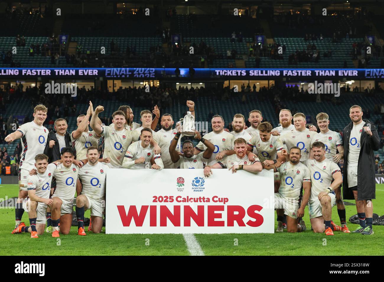 England's Maro Itoje, center, and his team celebrate with the Calcutta ...