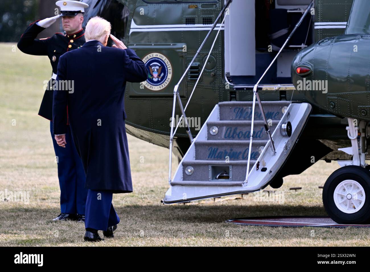 President Donald Trump walks to board Marine One as he leaves the White ...