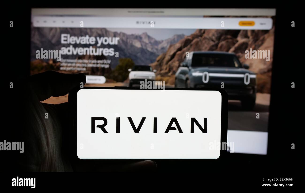 In this photo illustration, a person is holding a cellphone with the ...