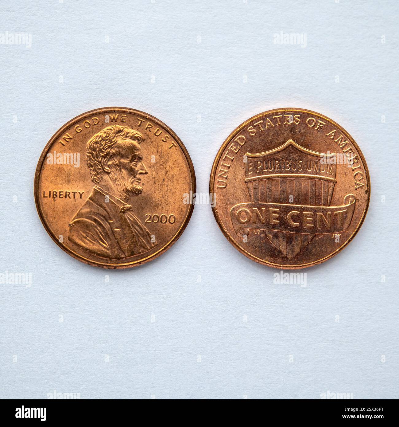 Still life of the front and reverse sides of an American one cent coin ...