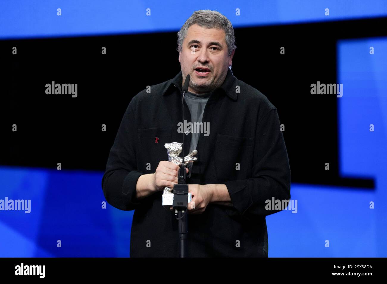 Radu Jude accepts the Silver Bear for best screenplay for the film ...