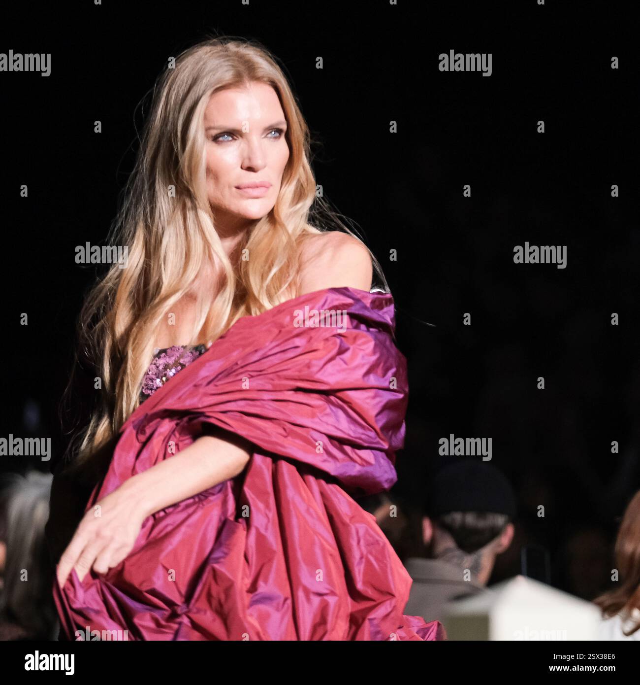Esther Canadas walks the runway wearing a design by Lola Casademunt ...