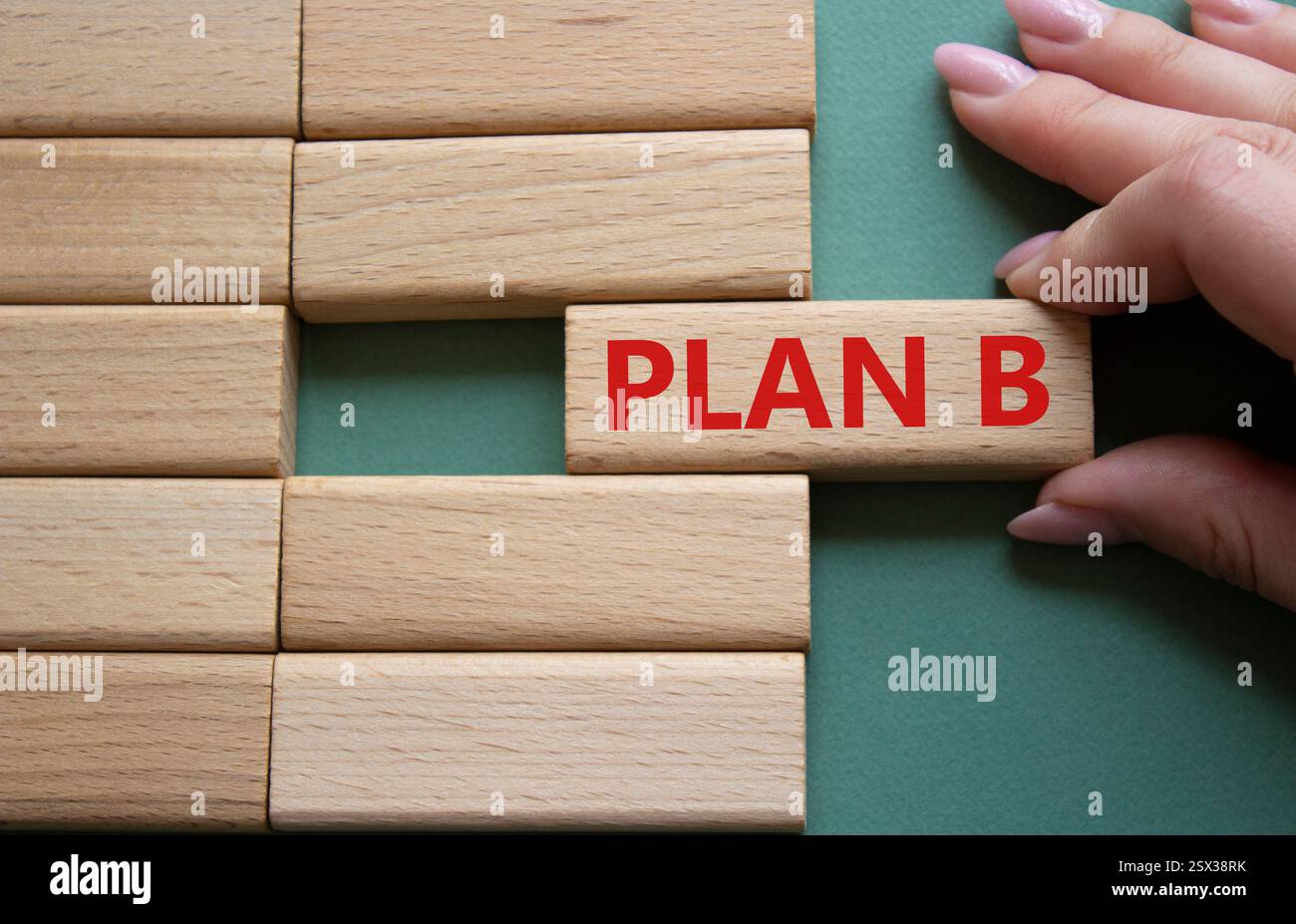 Plan B symbol. Concept word Plan B on wooden blocks. Beautiful grey green background ...