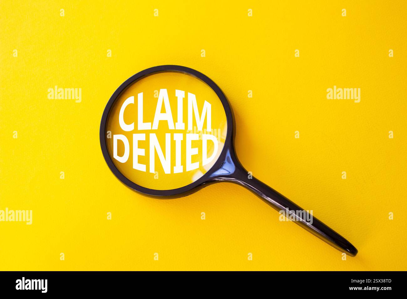 Claim denied symbol. Magnifying Glass with Concept word Claim denied ...