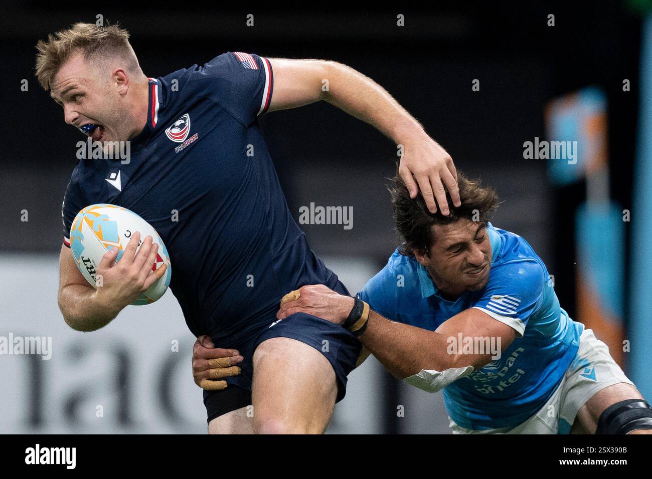 United States' Jack Wendling is tackled by Uruguay's Tomas Etcheverry ...