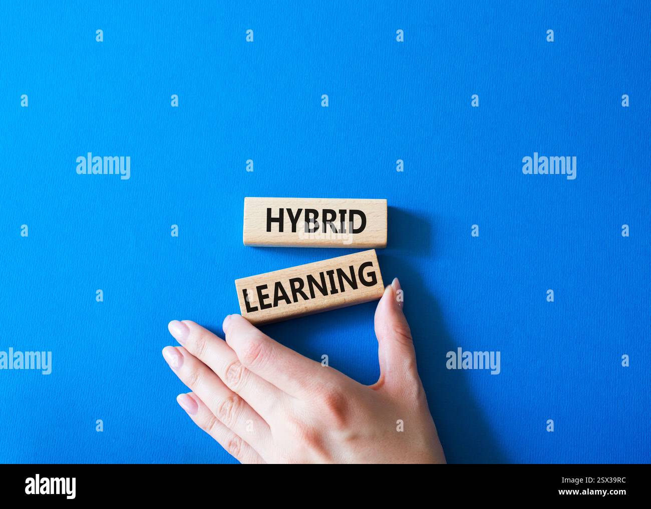Hybrid learning symbol. Concept word Hybrid learning on wooden blocks ...