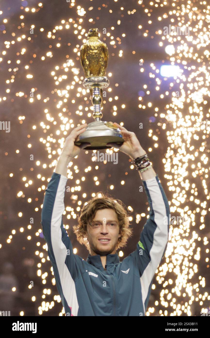 Andrey Rublev of Russia celebrates with the trophy on the podium after ...