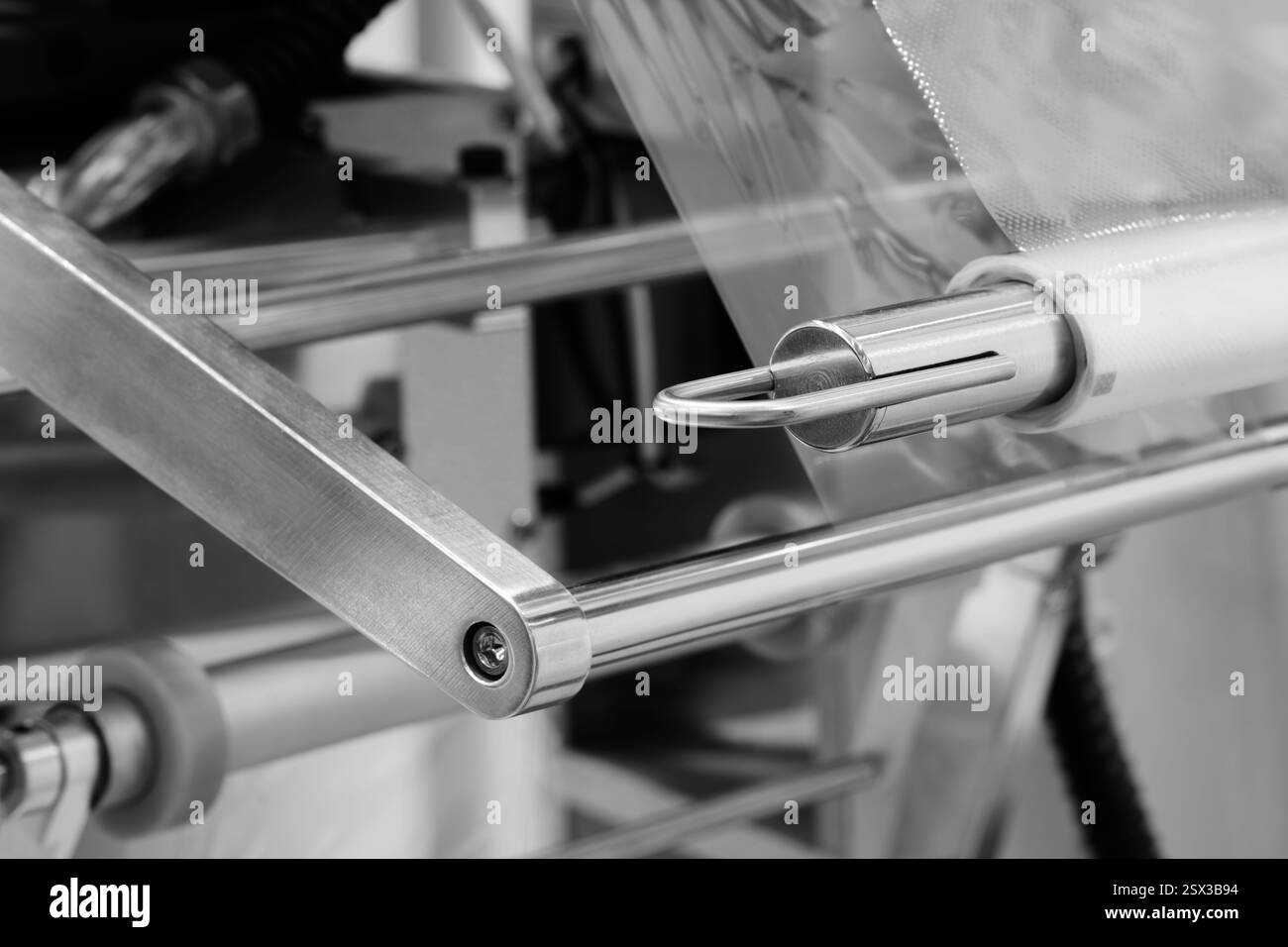 Automatic polyethylene plastic bag production machine. Close-up of ...