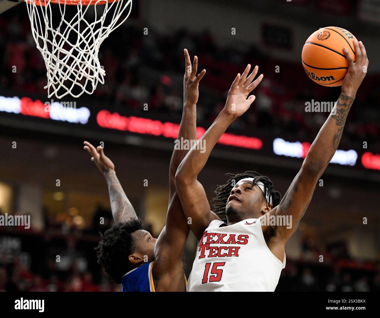 Texas Tech forward JT Toppin (15) goes for a shot as West Virginia ...