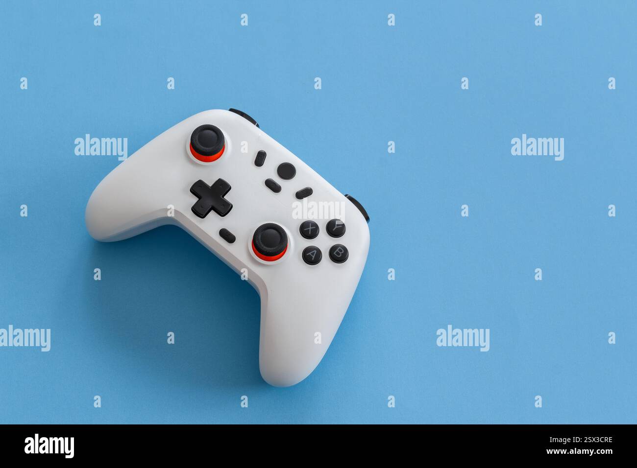Blue game controller on hi-res stock photography and images - Alamy