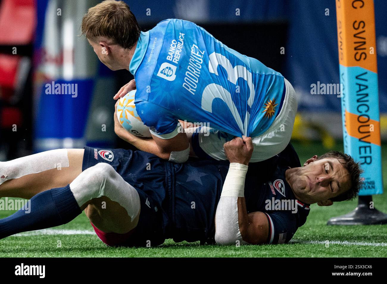 Vancouver, Canada. 22nd Feb, 2025. United States' Ben Broselle tackles ...