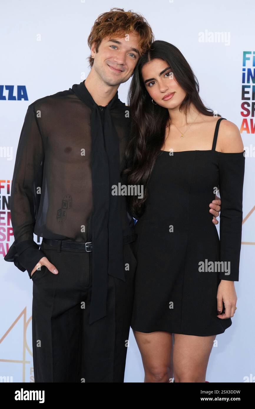 Daniel Seavey, left, and Katia Castellano arrive at the Film ...