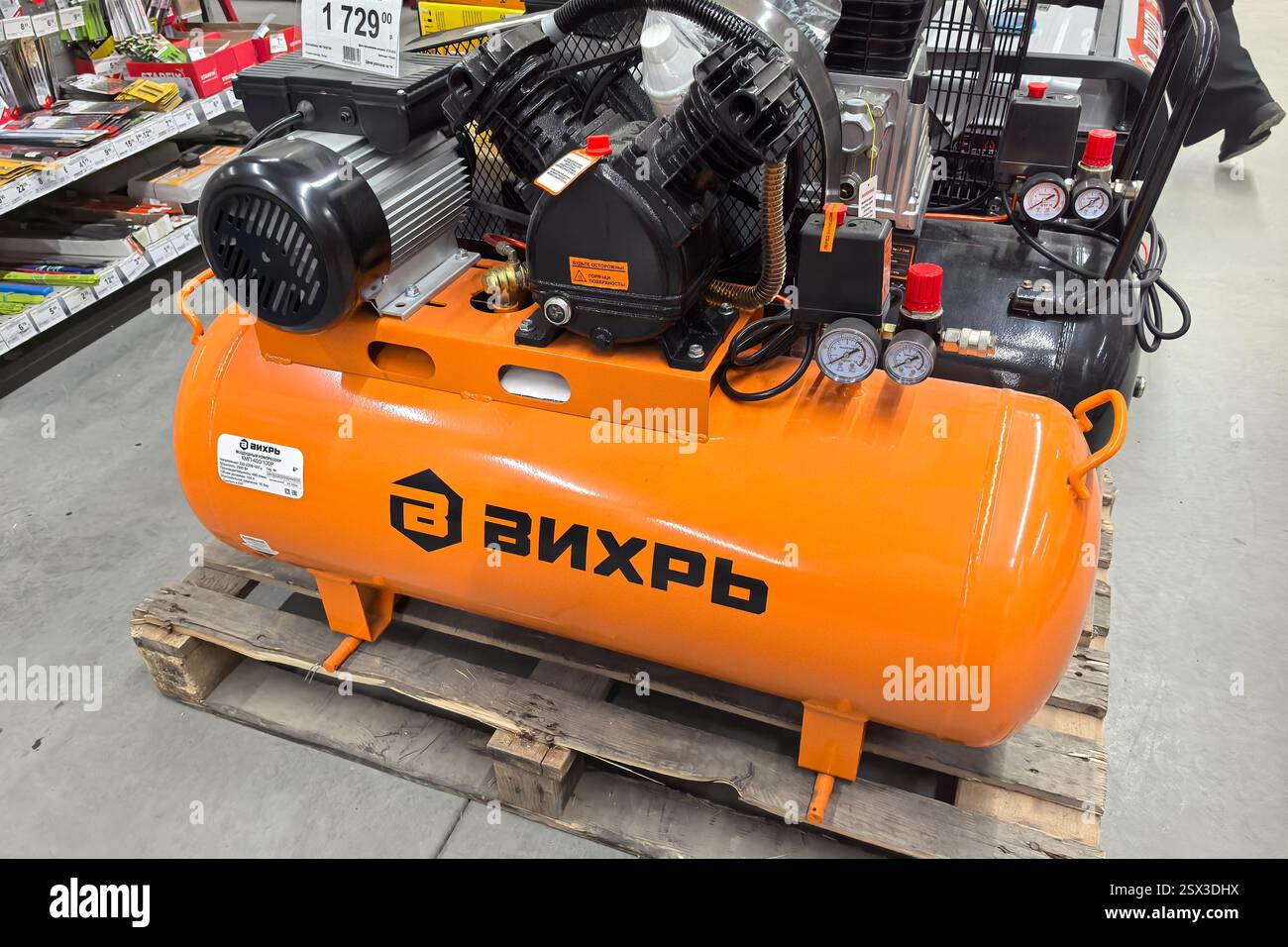 Bobruisk, Belarus - February 21, 2025: A bright orange air compressor ...