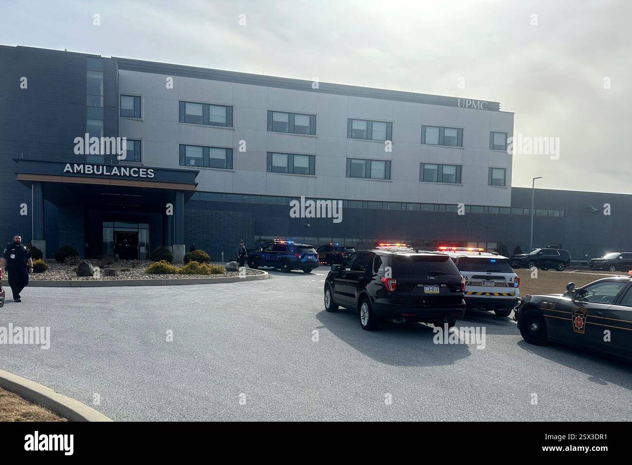 Law enforcement arrive at the scene of a shooting at UPMC Memorial ...