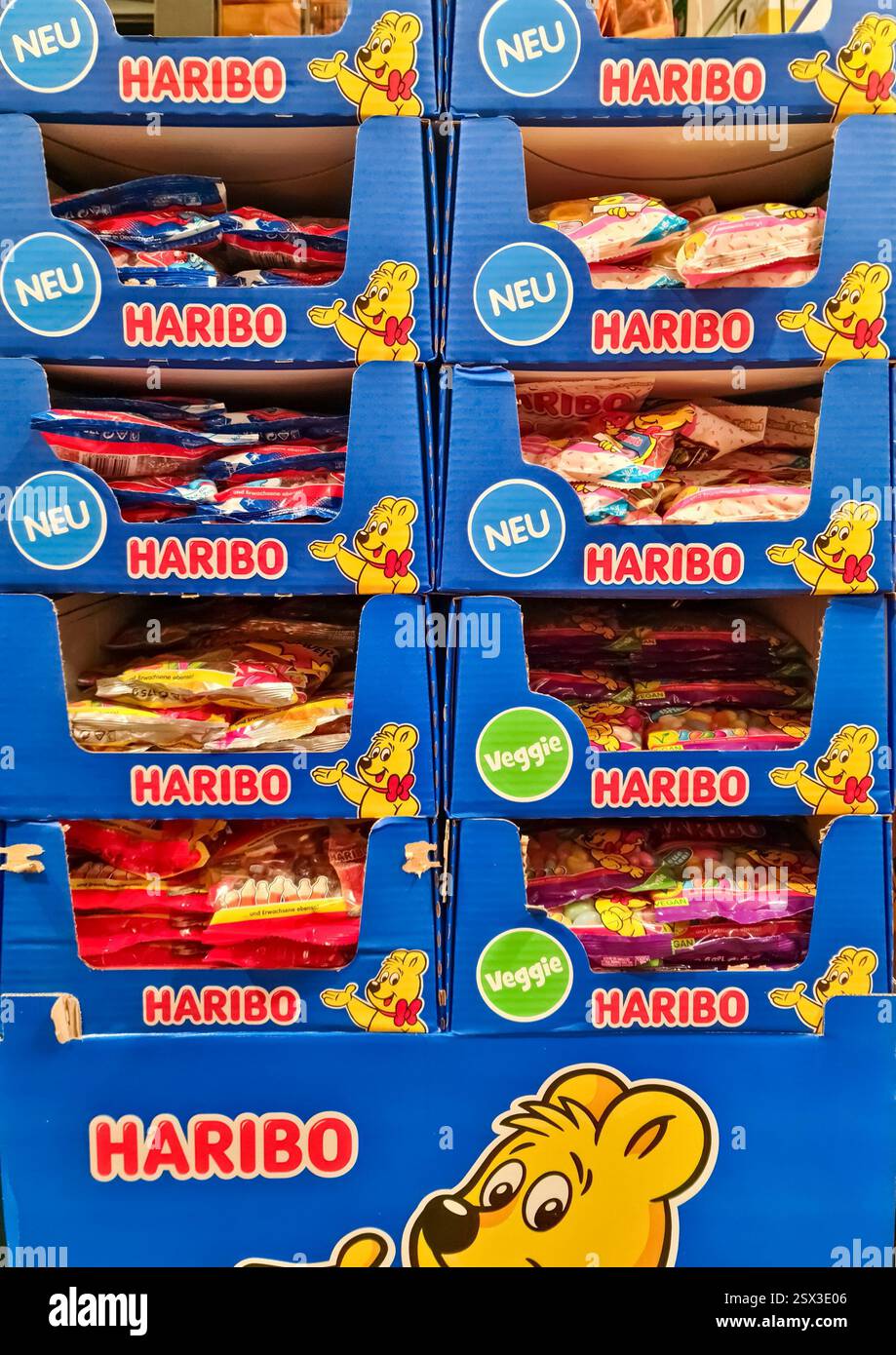 Kiel, 21. February 2025: Colorful HARIBO candy bags filling shelves in ...