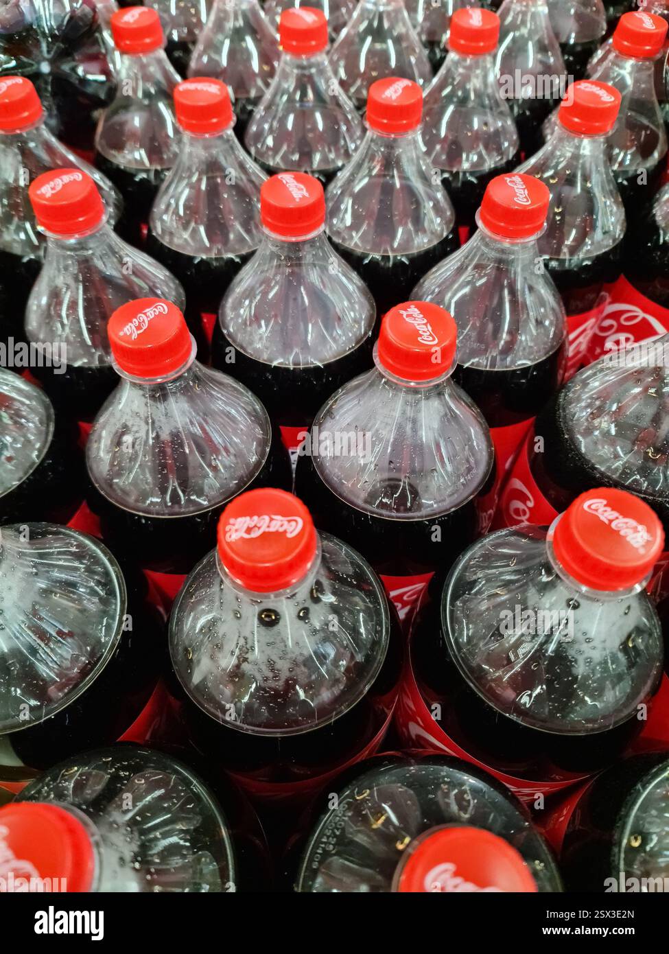 Kiel, 21. February 2025: Tightly packed Coca-Cola bottles create a ...