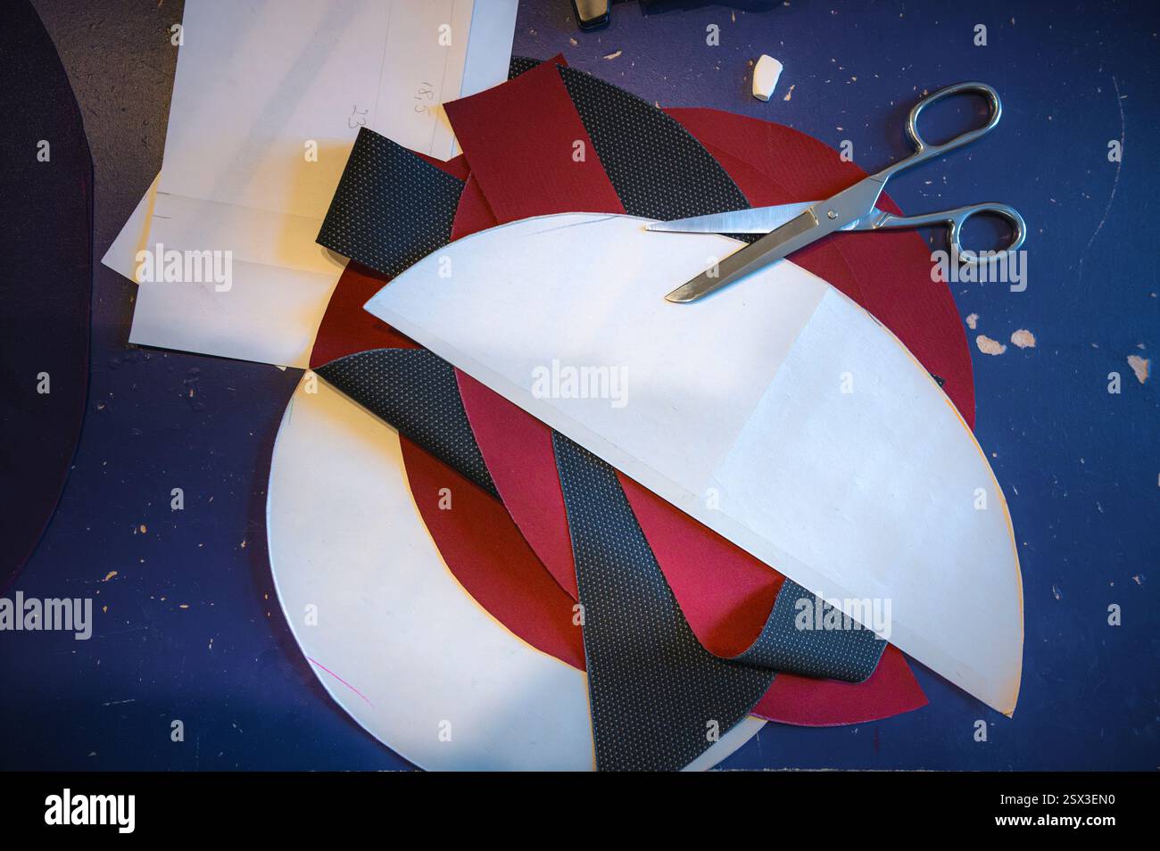 Handmade tailoring workshop, the process of marking and cutting fabric ...