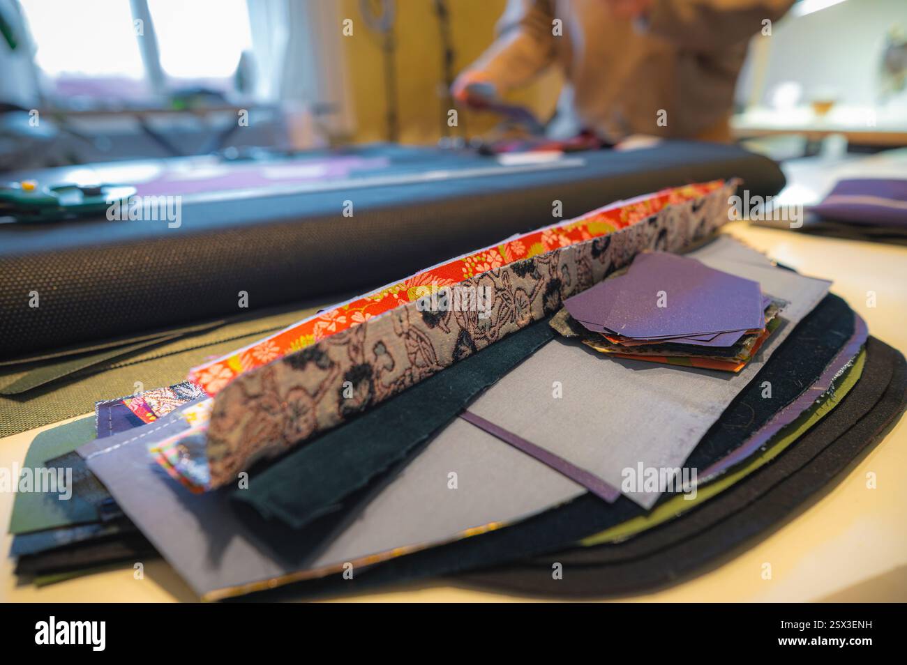 Handmade tailoring workshop, the process of marking and cutting fabric ...