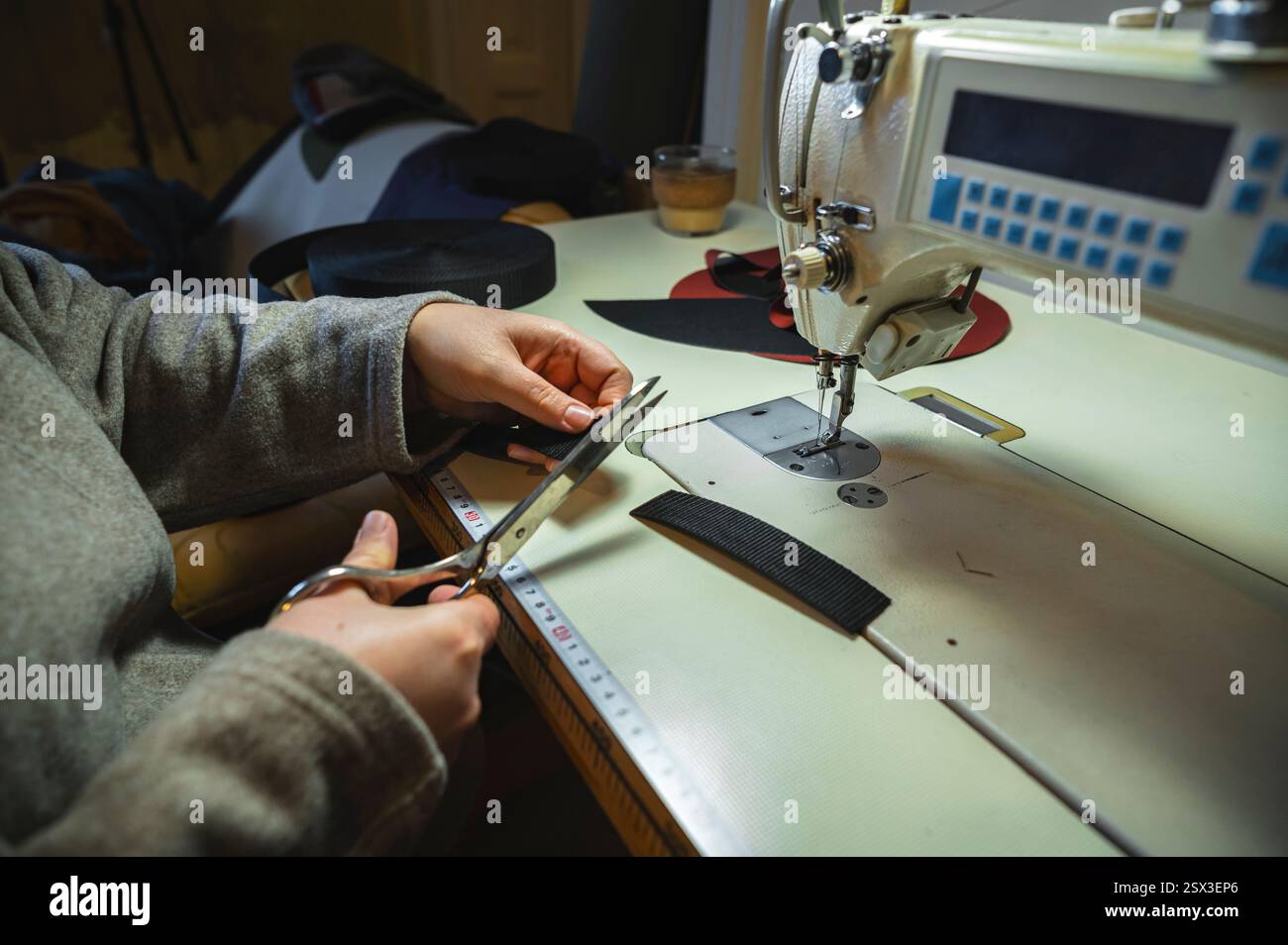 Handmade tailoring workshop with sewing machine Stock Photo - Alamy