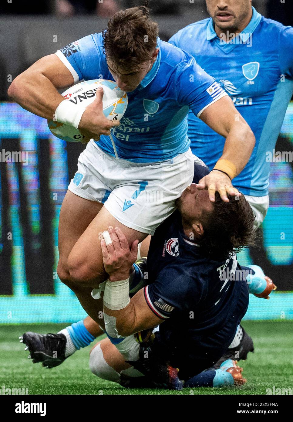 Uruguay's Juan Gonzalez is tackled by United States' Pita Vi during a ...