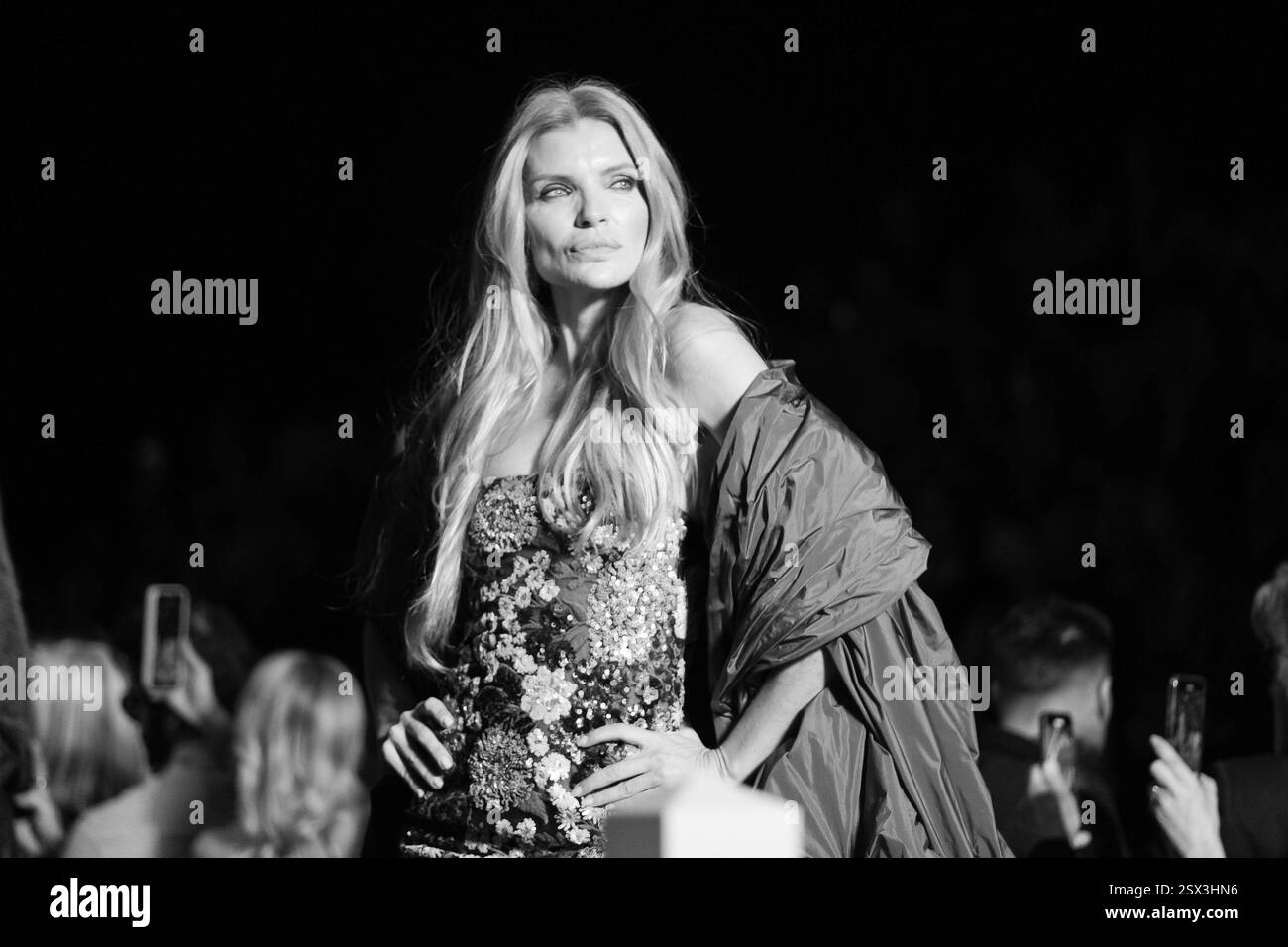 Esther Canadas walks the runway wearing a design by Lola Casademunt ...