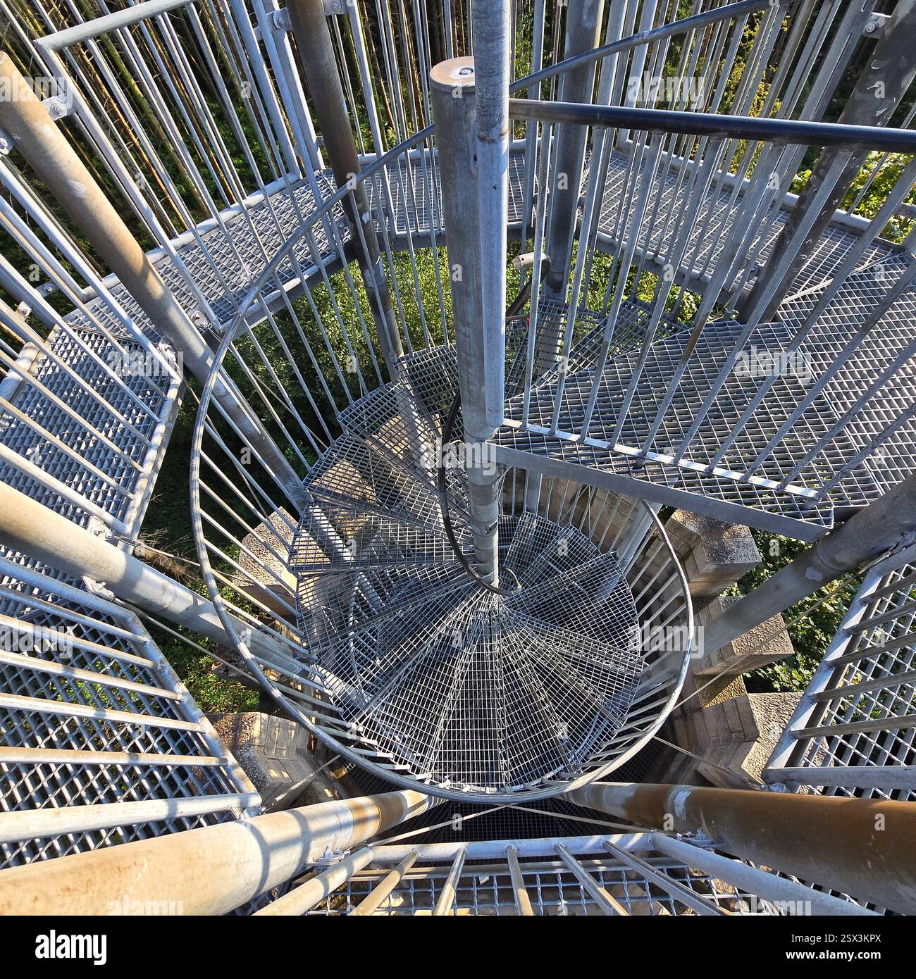 An intricate design of a visually appealing metal spiral staircase ...