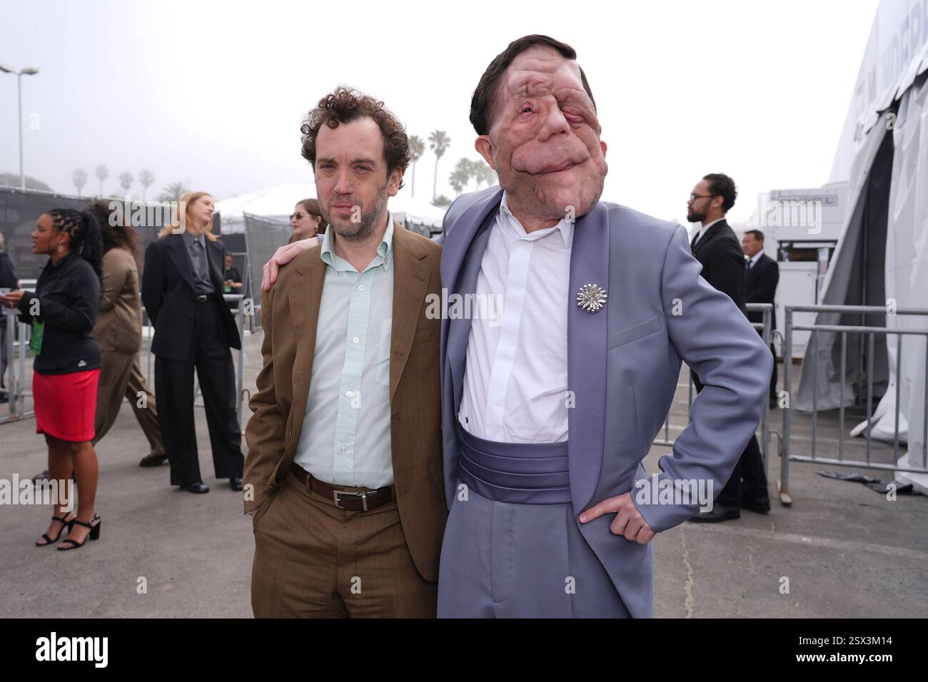 Aaron Schimberg, left, and Adam Pearson arrive at the Film Independent ...