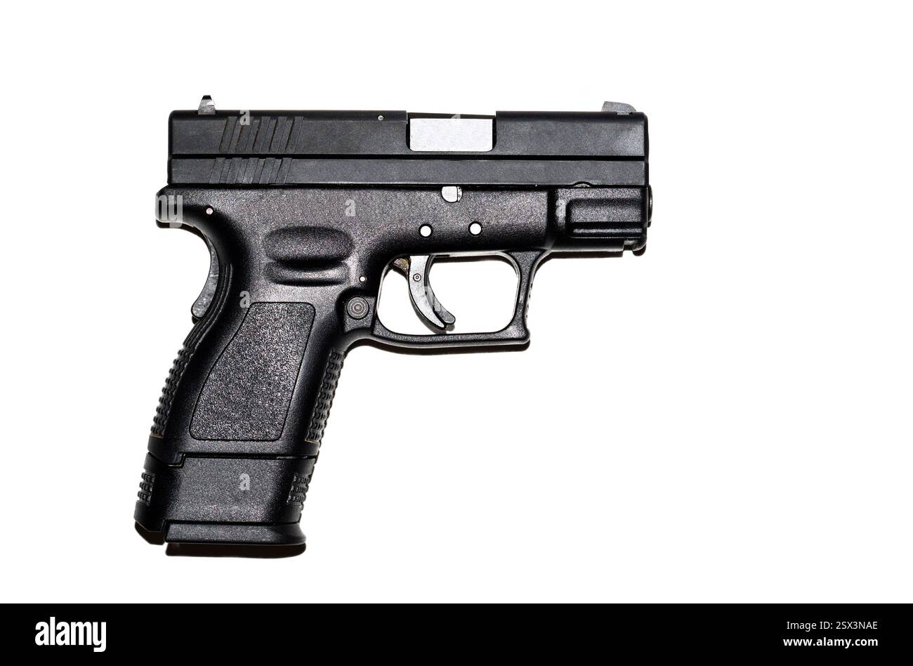 Compact black semi automatic handgun concealed carry license on white ...