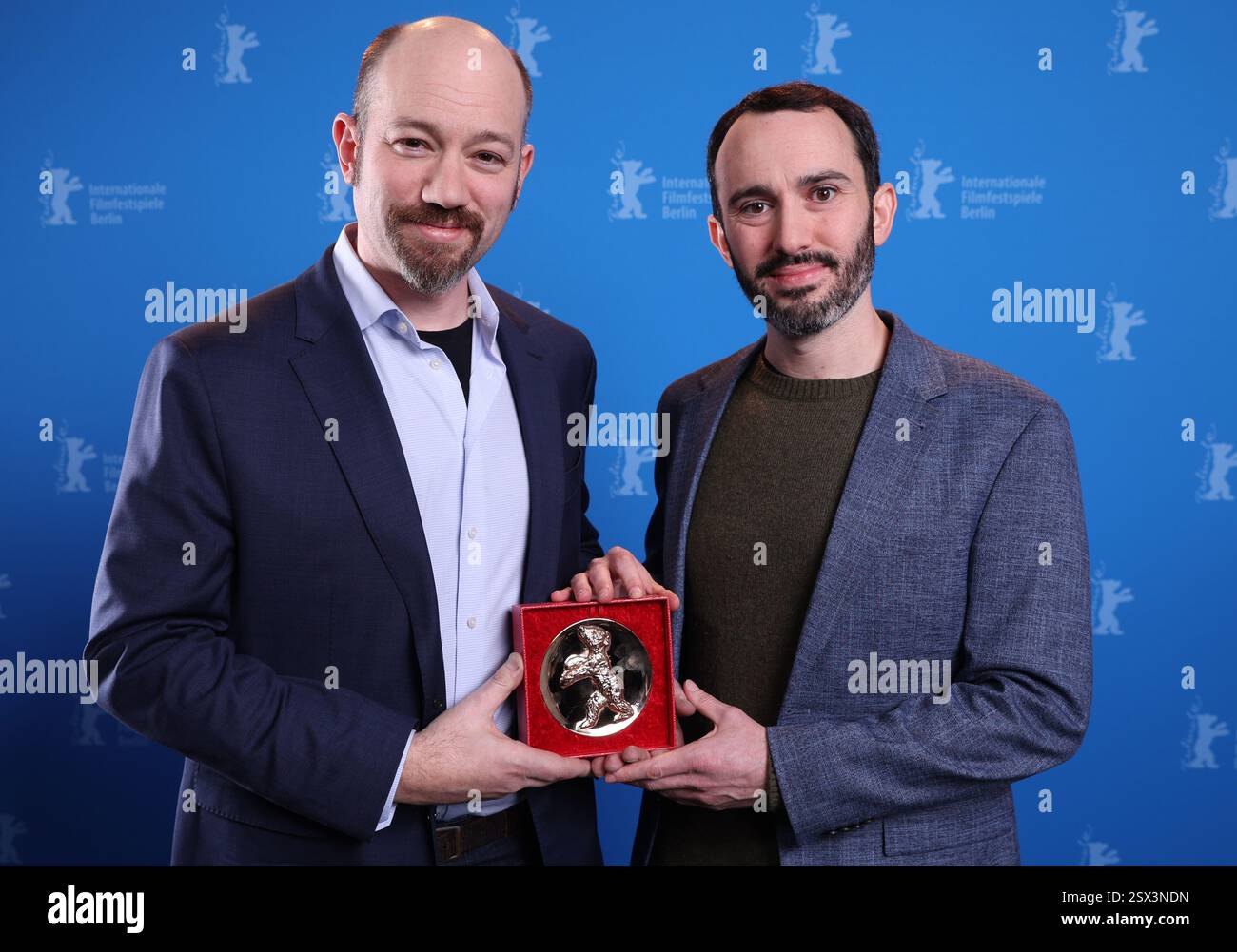 Berlin, Germany. 22nd Feb, 2025. US director Brandon Kramer (r) and US ...
