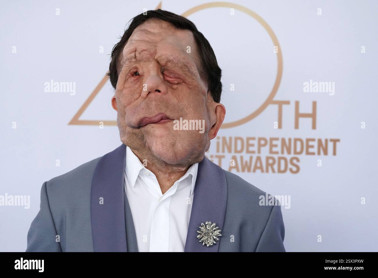 Adam Pearson arrives at the Film Independent Spirit Awards on Saturday ...