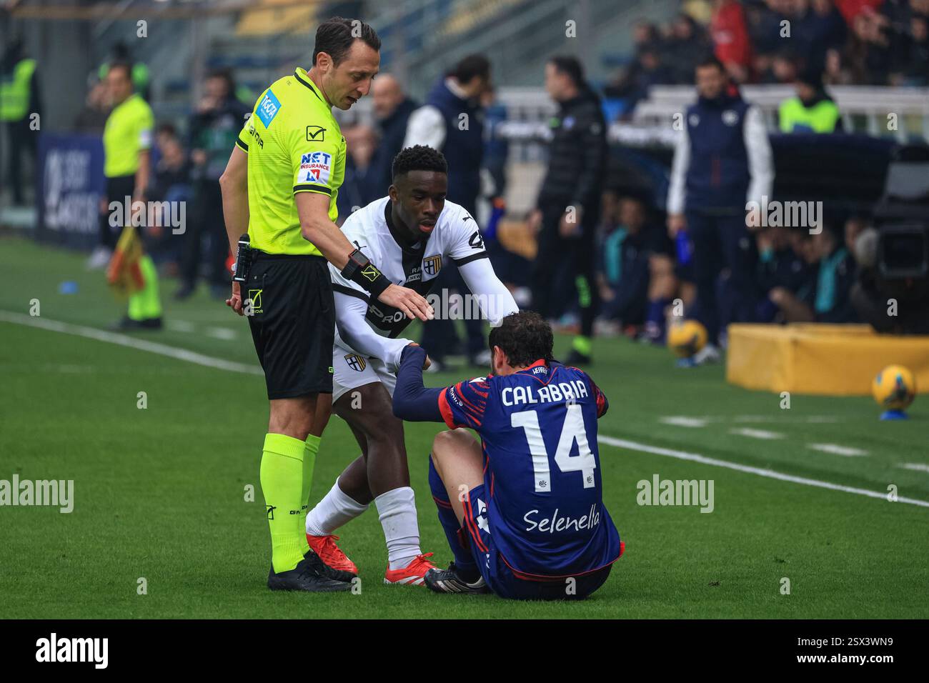 Parma, Italy. 22nd Feb, 2025. Mandela Keita (Parma Calcio) helps Davide ...