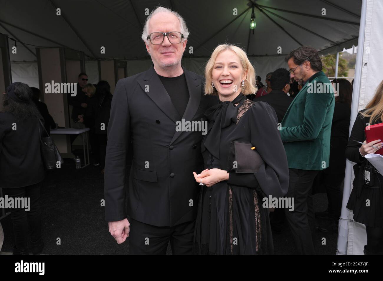 Tracy Letts, left, and Carrie Coon arrive at the Film Independent ...