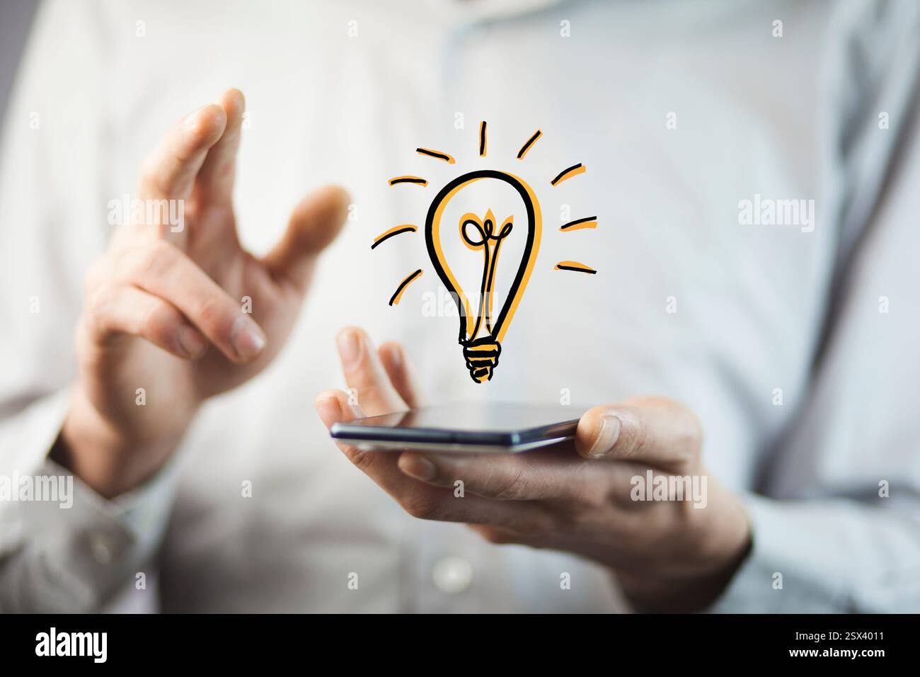 business man hand phone with idea in screen Stock Photo - Alamy