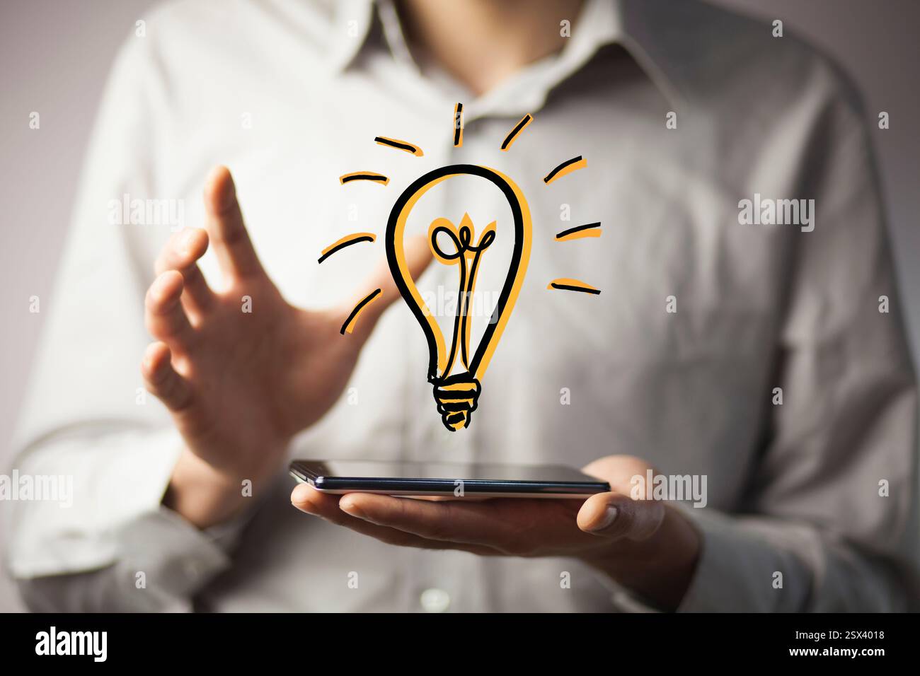 business man hand phone with idea in screen Stock Photo - Alamy