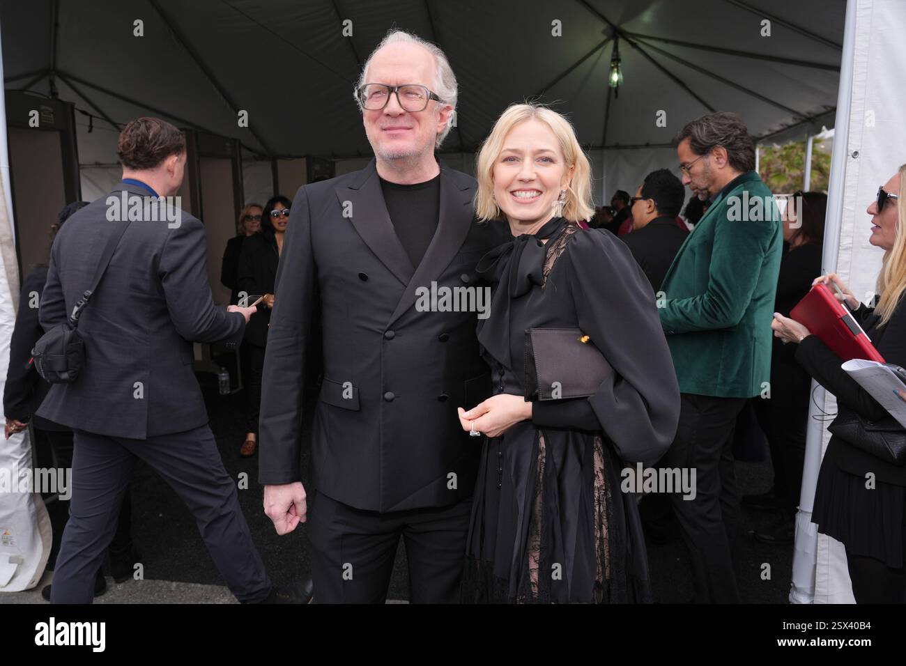 Tracy Letts, left, and Carrie Coon arrive at the Film Independent ...