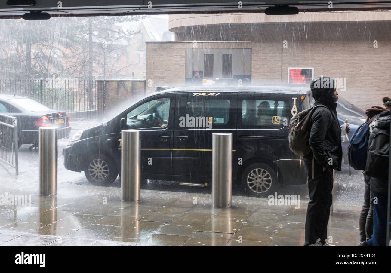 Manchester, England, UK. 20th February 2025, UK weather. Torrential ...