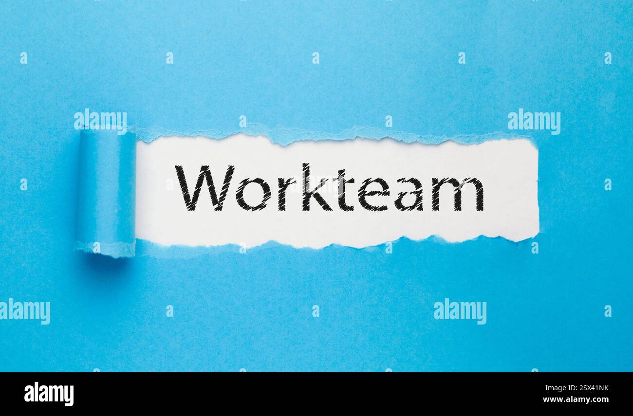 work team written paper on blue background Stock Photo - Alamy