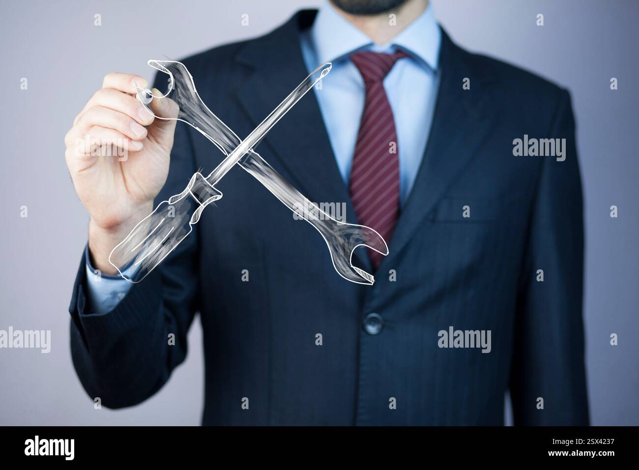 man hand mechanic tools in the screen Stock Photo - Alamy