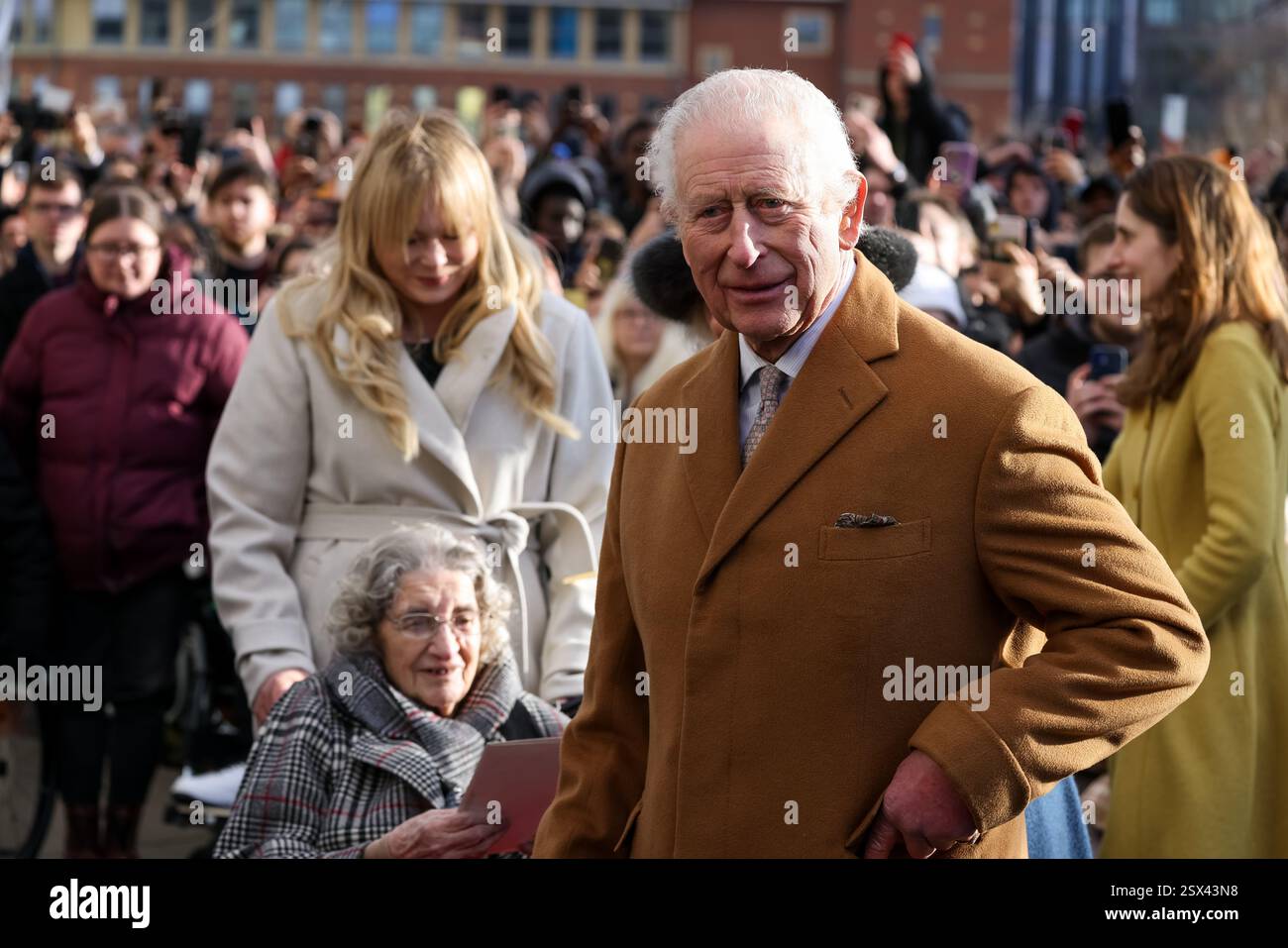 King Charles and Queen Camilla meet members of the public and local ...