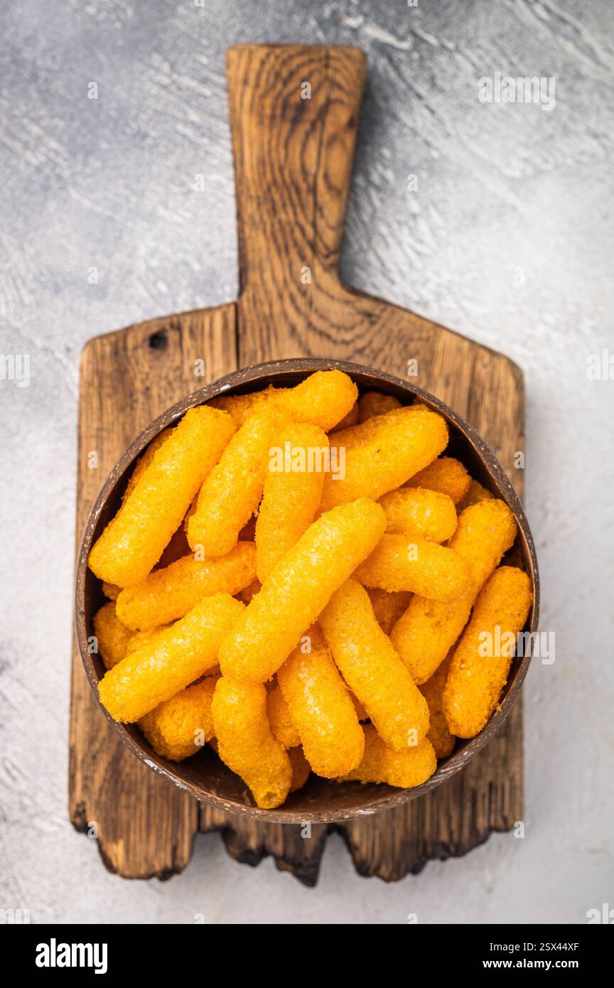 Irresistible Cheese puffs, cheese snacks bursting with bold flavors and ...