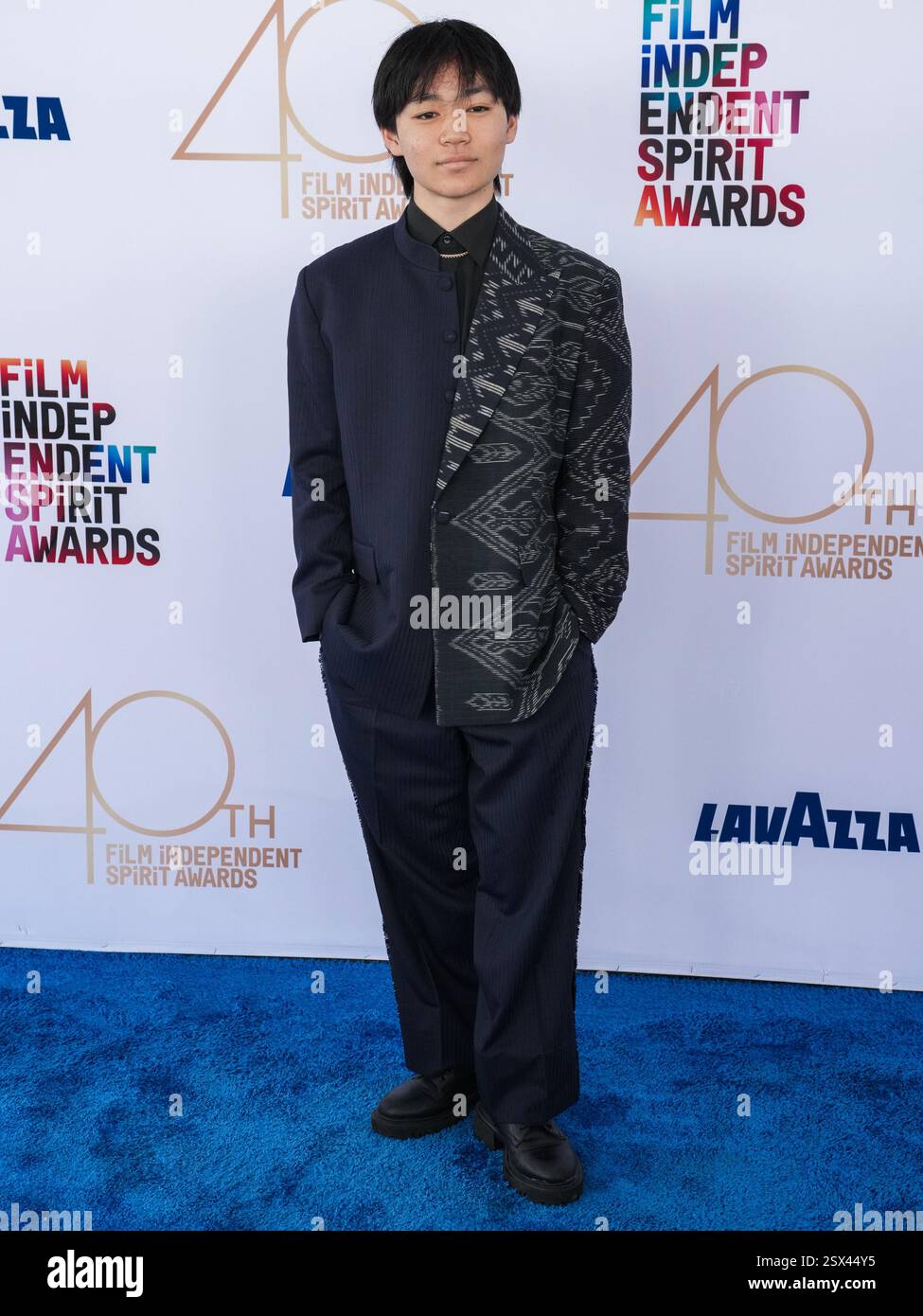 Los Angeles, USA. 22nd Feb, 2025. Izaac Wang walking on the red carpet ...