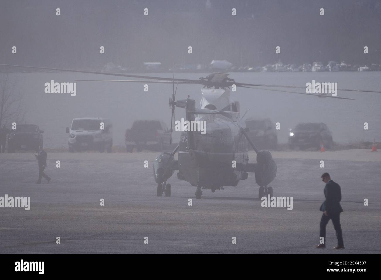 Marine One kicks up clouds of dust into the air as U.S. President ...
