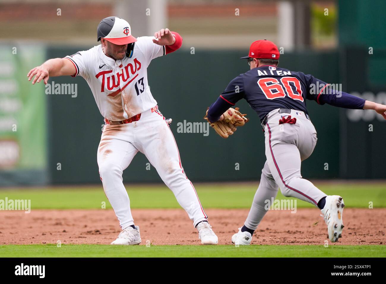 Minnesota Twins Ty France (13) is caught in a a rundown by Atlanta ...