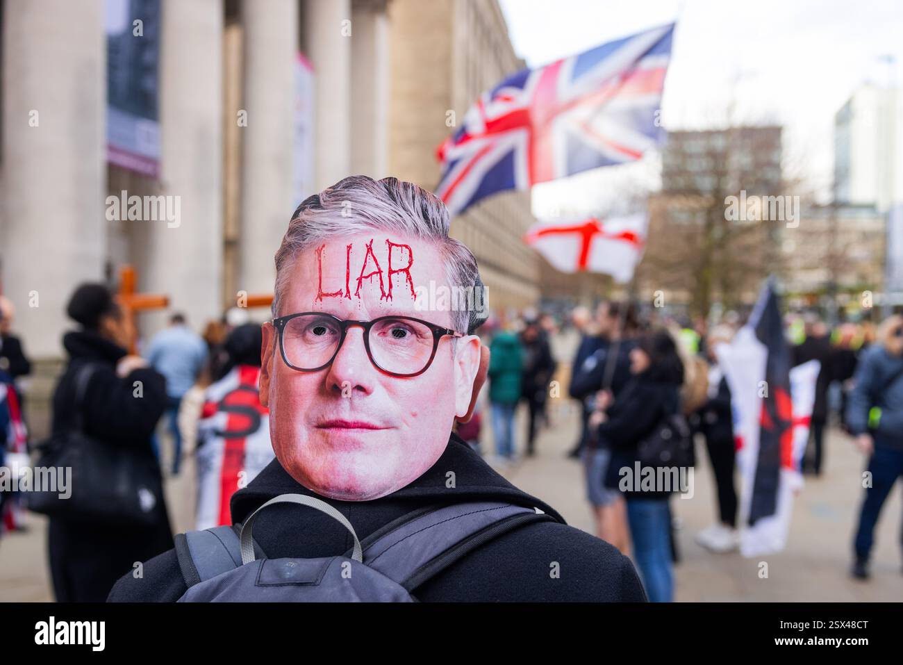 Manchester, UK. 22 FEB, 2025. Kier Starmer "Liar" face mask as ...