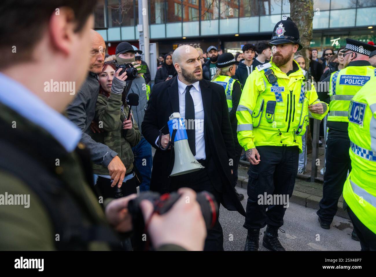 Manchester, UK. 22 FEB, 2025. Nick Tenconi, leader of Ukip, leads a ...