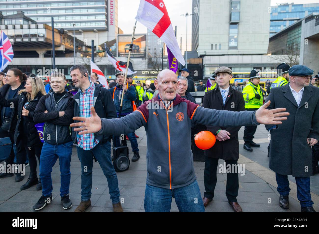 Manchester, UK. 22 FEB, 2025. Activists chant towards rival group as ...