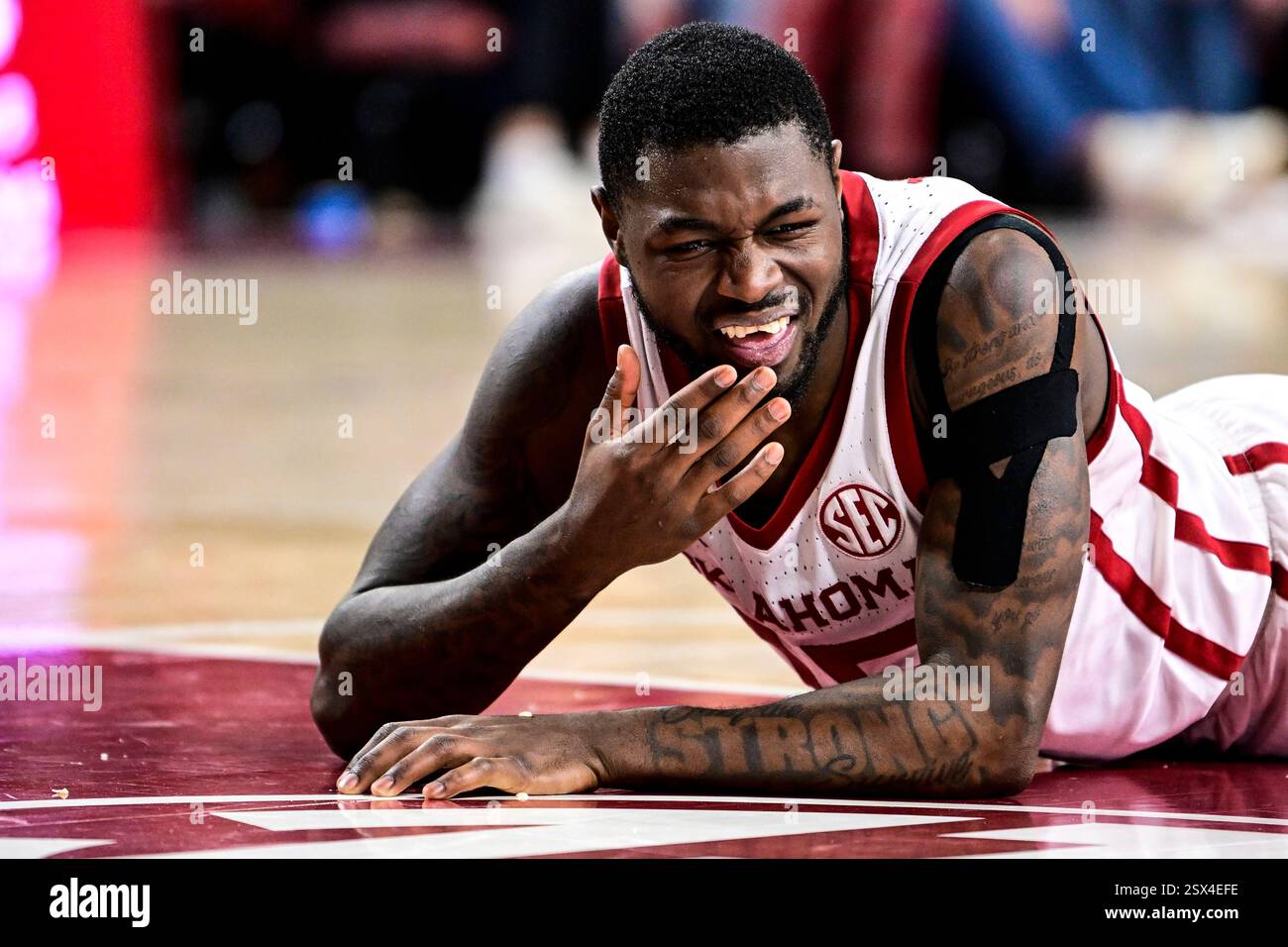 Oklahoma guard Duke Miles (15) breaks tooth after falling during the ...