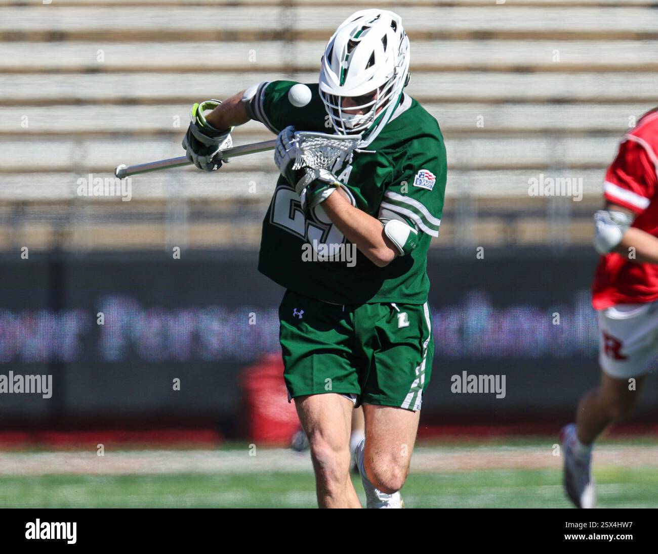 February 22, 2025: Loyola Maryland defender Remi Reynolds (29) tries to ...