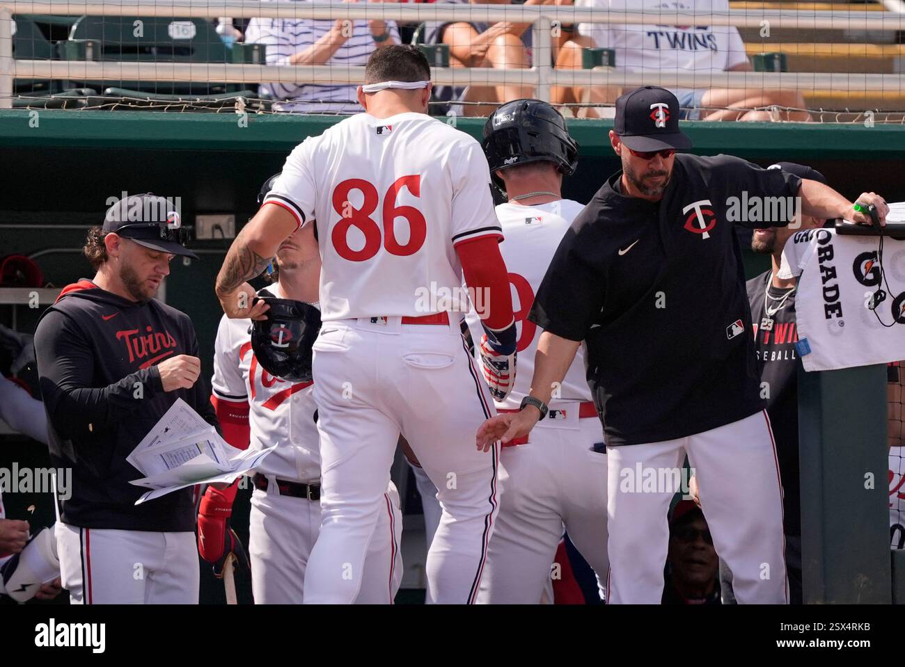 Minnesota Twins Carson McCusker and Kala'i Rosario (86) are greeted at ...
