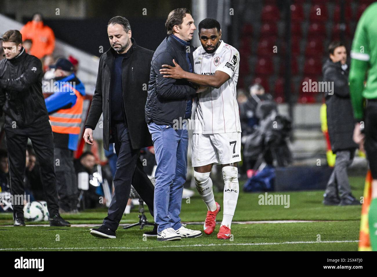 Antwerp, Belgium. 22nd Feb, 2025. Antwerp's head coach Jonas De Roeck and Antwerp's Gyrano Kerk ...